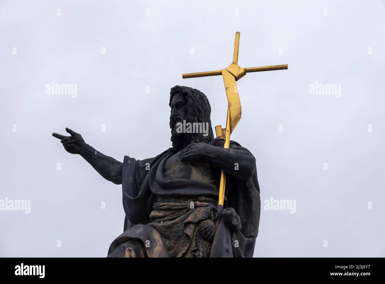 Charles Bridge, Prague, Czech Republic, bridge figure John the Baptist ...
