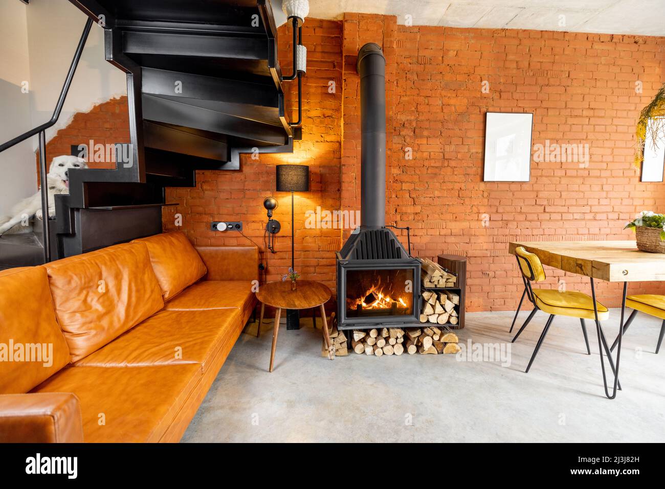 Cozy living room interior in loft style Stock Photo - Alamy