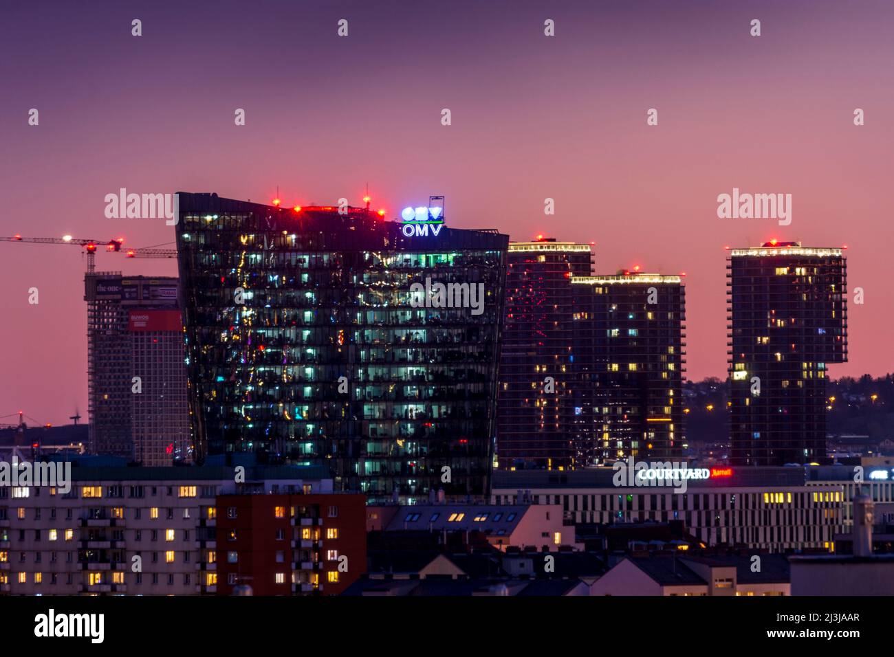 Vienna, OMV headquarters (front), TrIIIple Towers (back) in district 00 ...