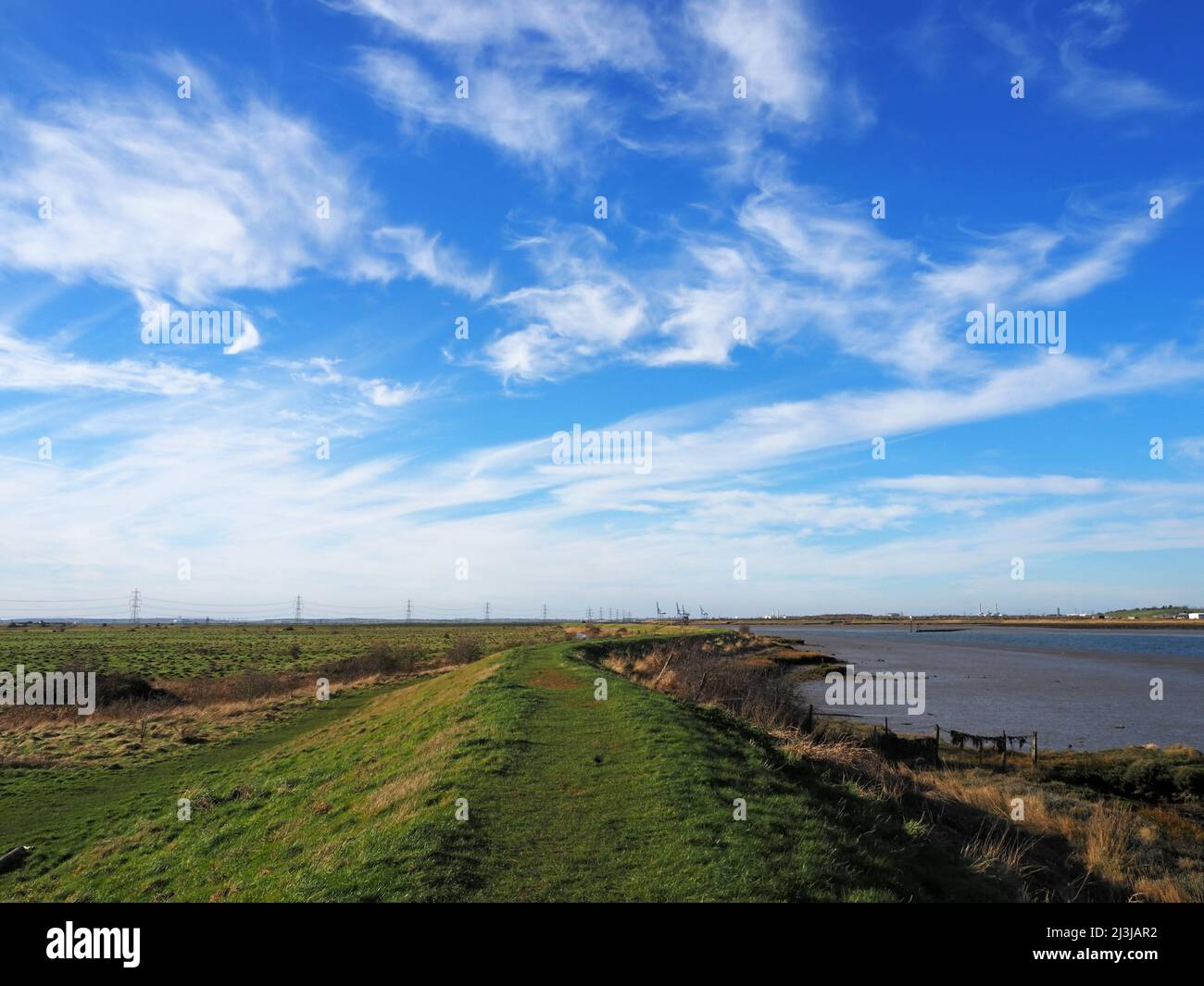 Saxon Shore Way beside Ferry Marshes on the Swale Estuary Kent England ...