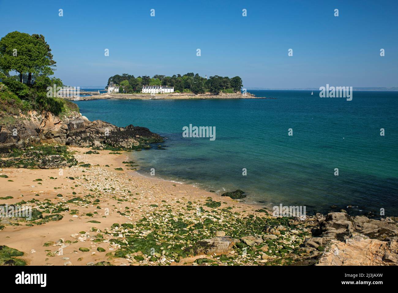 Beach in Douarnenez, in the background the small tidal island Ile ...