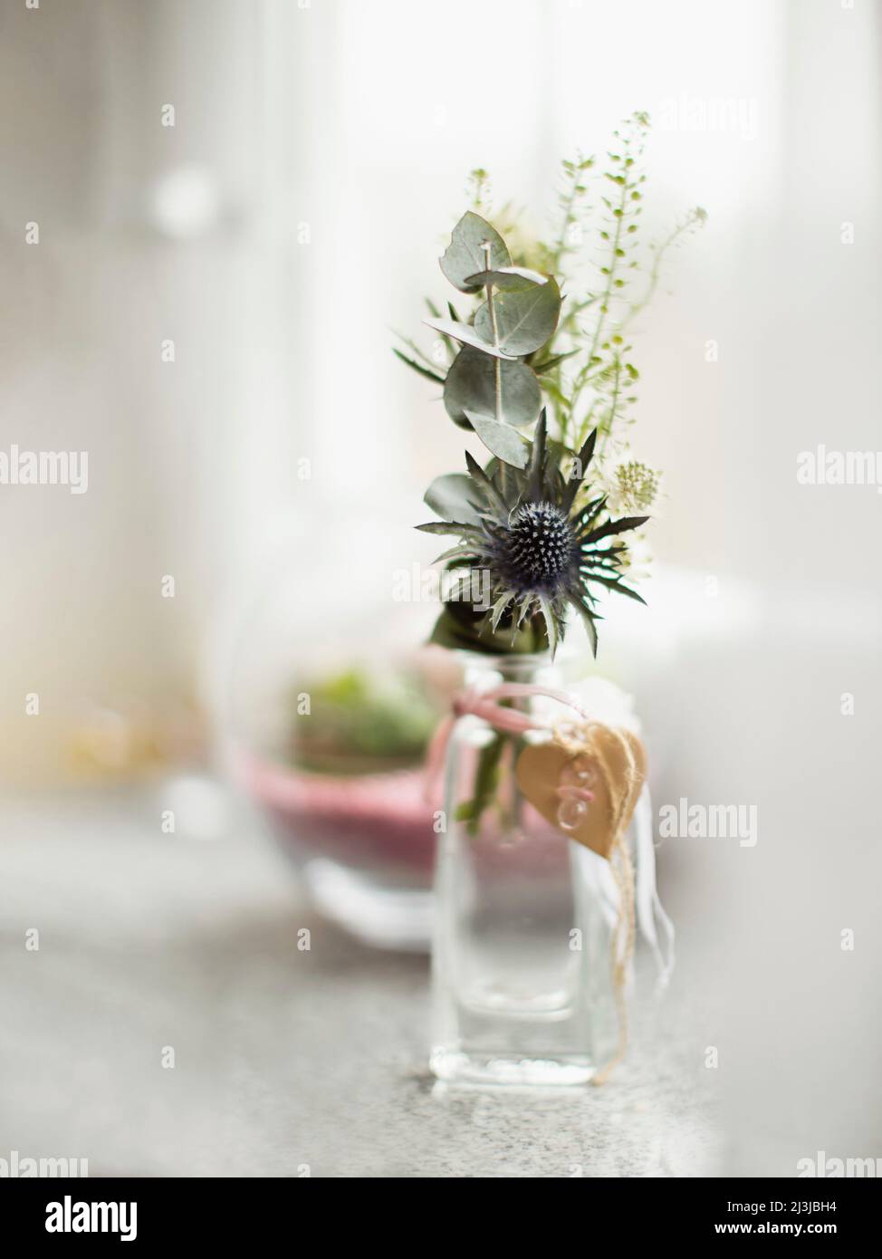 Table decoration with thistle Stock Photo - Alamy