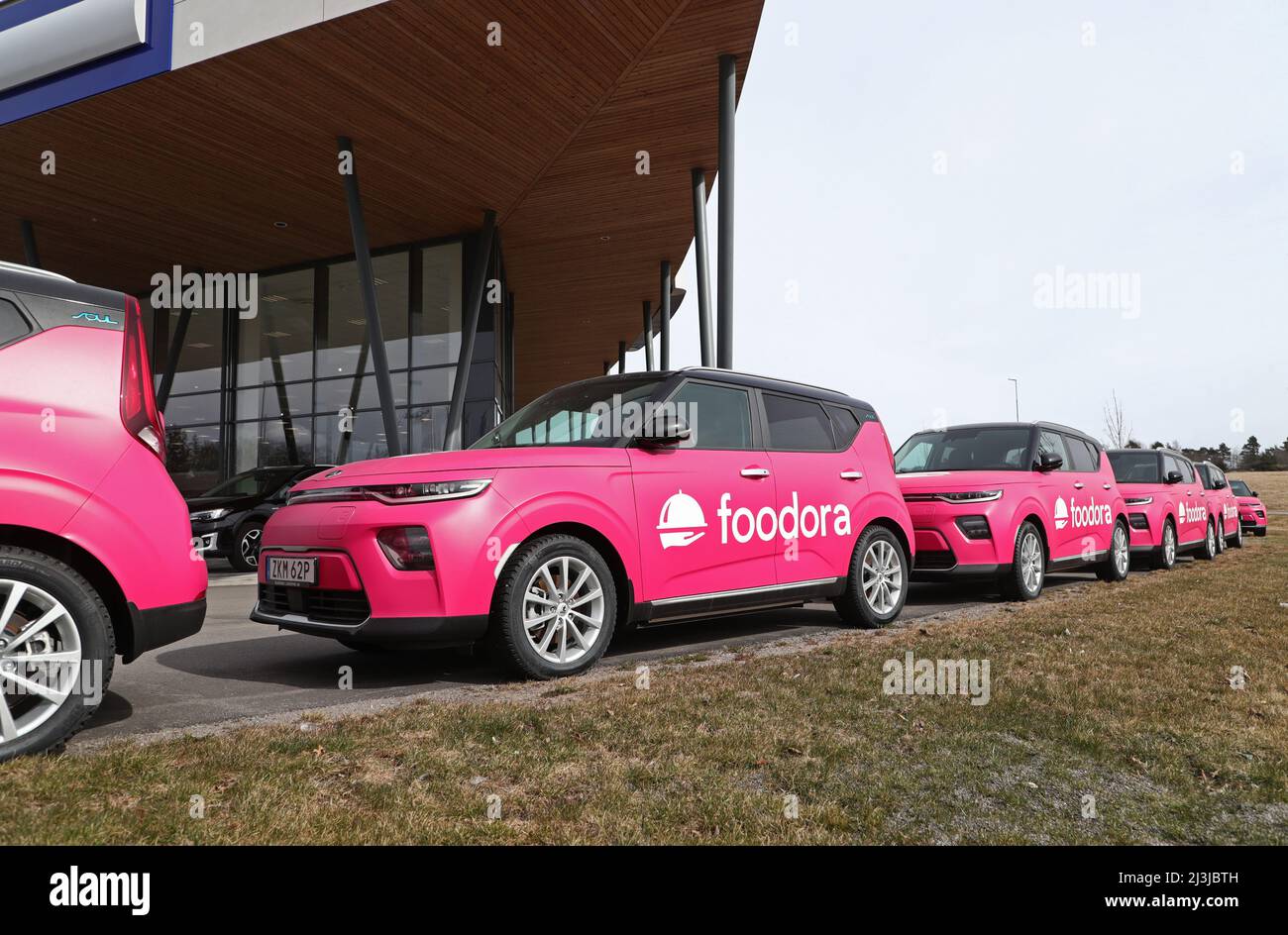 New electric cars, of the brand Kia Soul EV, at a car dealership, for ...
