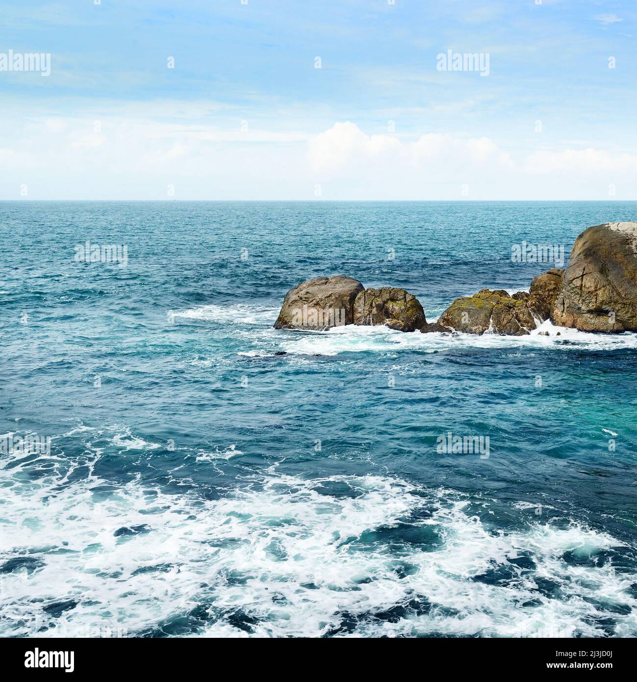 large rock in the ocean Stock Photo - Alamy
