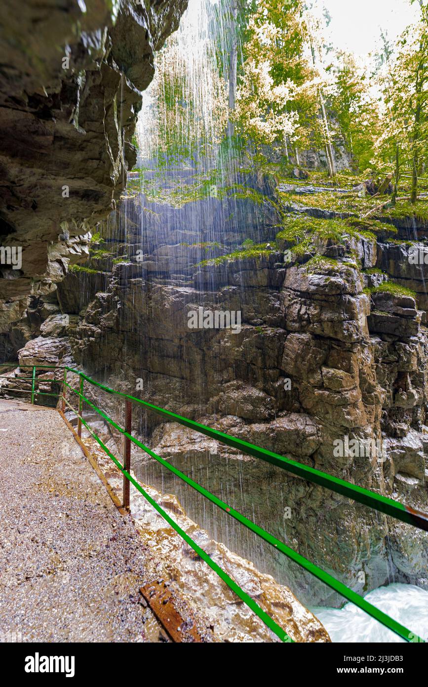 Water falls down the rock walls into the breitachklamm gorge hi-res ...