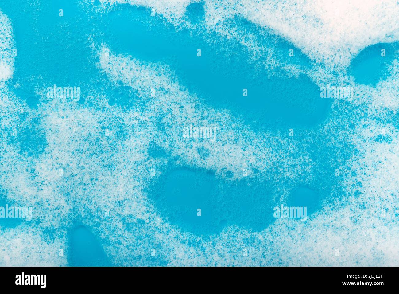 Soap foam. Background of dusty foam with bubbles of blue color for an ... Soap foam. Background of dusty foam with bubbles of blue color for an ...