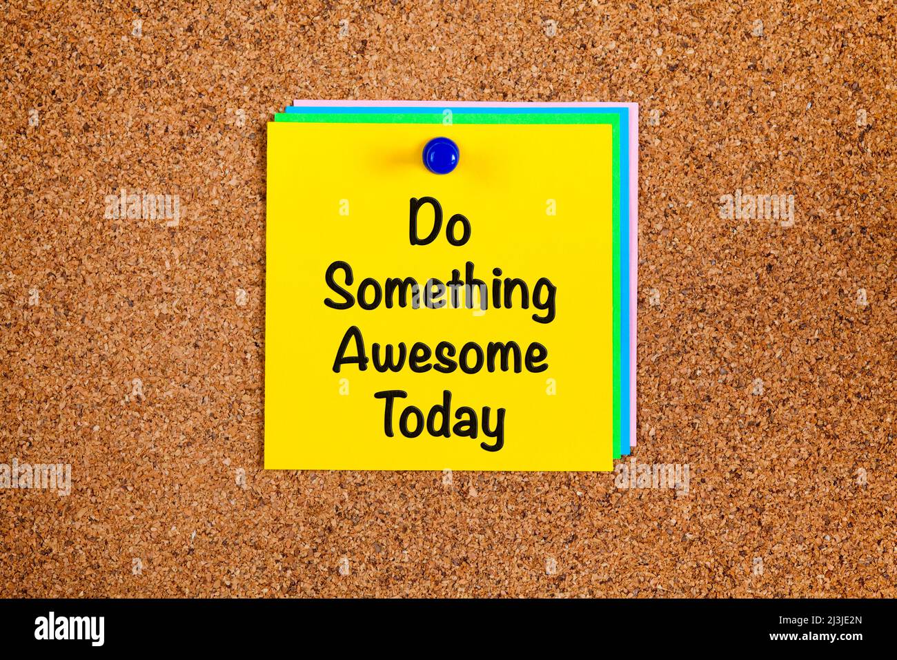 Paper notes with words Do Something Awesome Today on a corkboard Stock ...