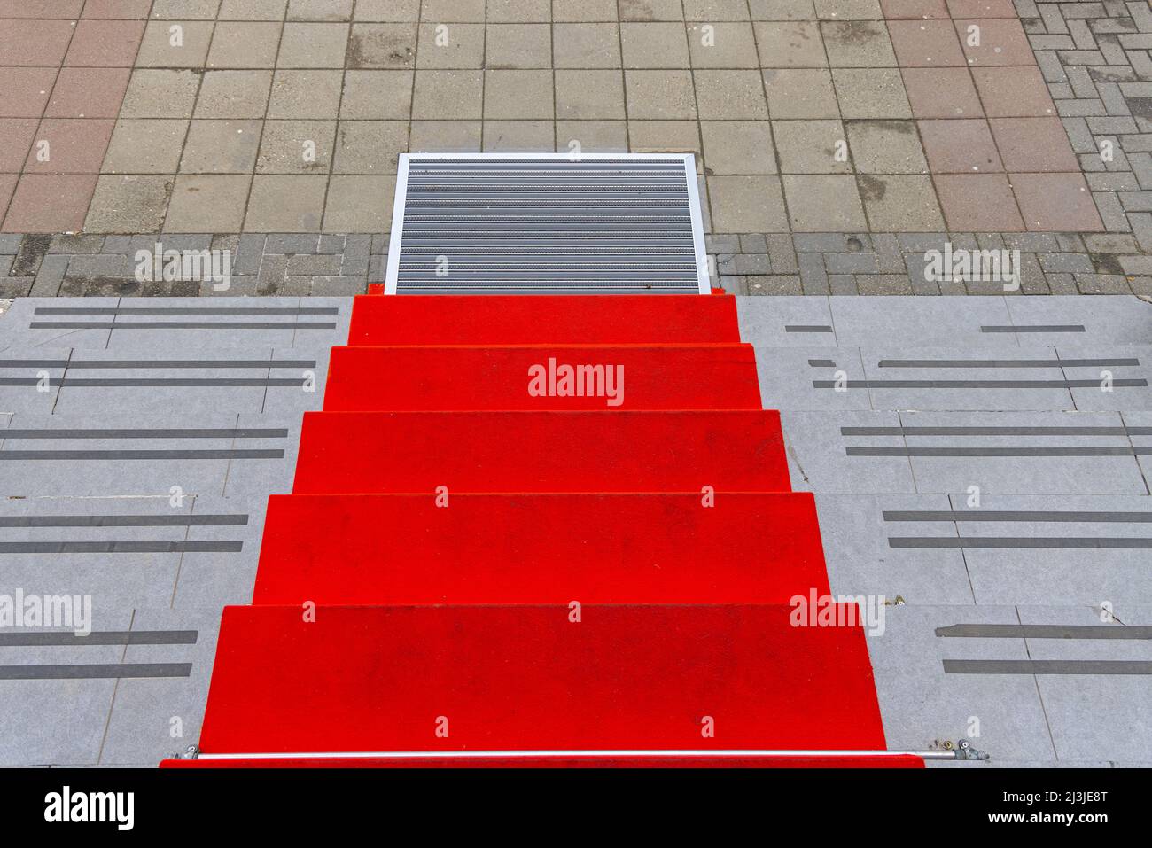 Used Red Carpet With Footsteps at Stone Stairs View Down Stock Photo ...