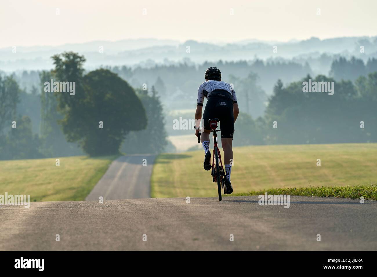 Young man on cycle hi-res stock photography and images - Alamy