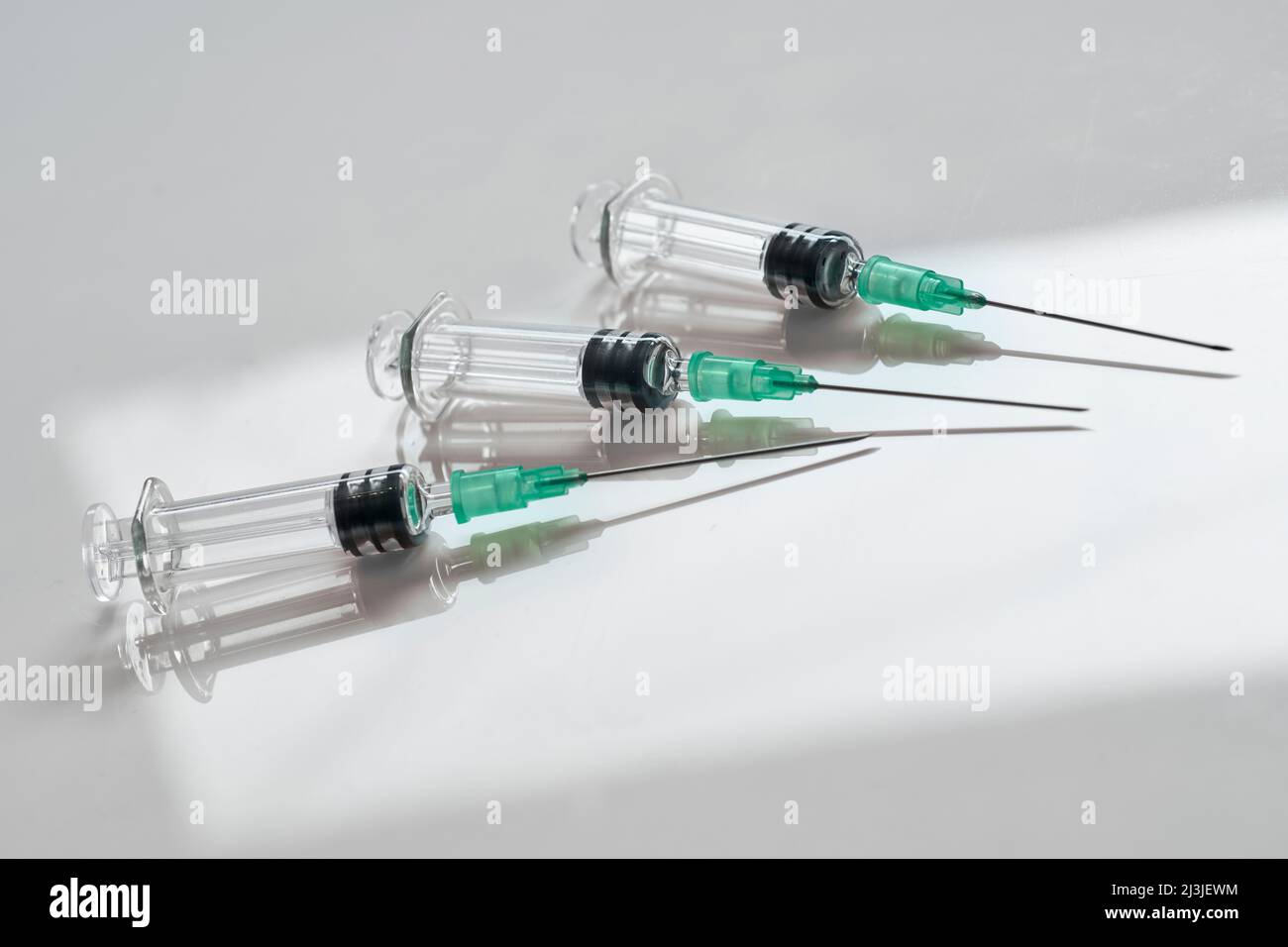 Syringes three syringes hi-res stock photography and images - Alamy