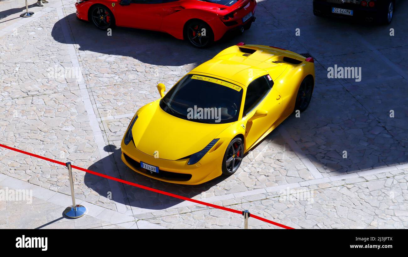 Ferrari 458 Spider. Ferrari is an Italian luxury sports car based in ...