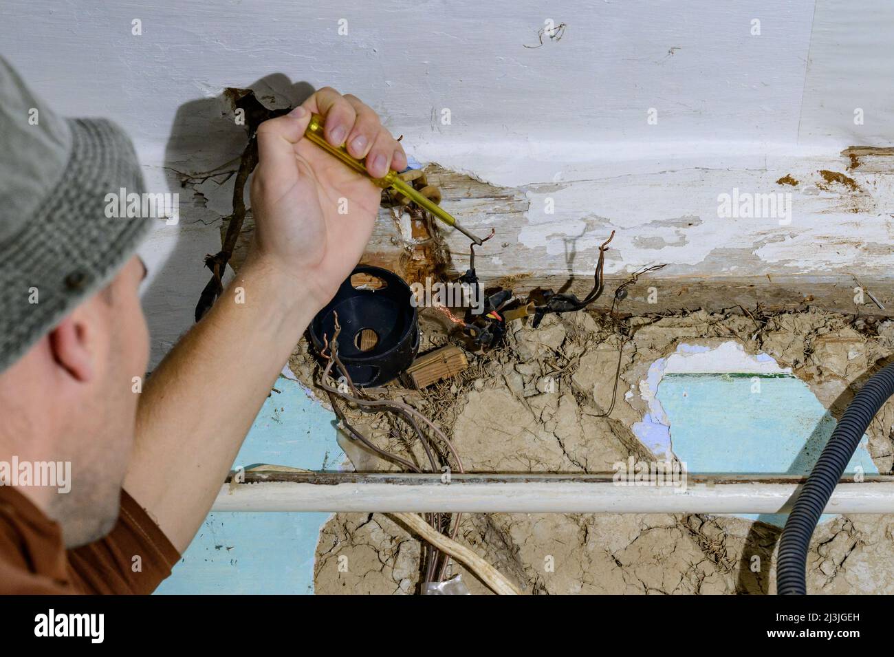 Old electrical wiring in the house, wooden walls in the house ...