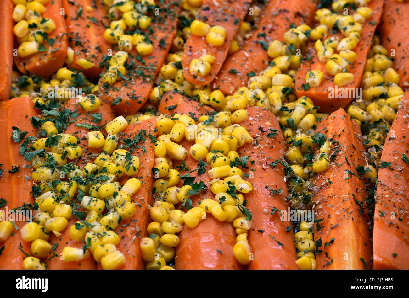 texture or background stewed red carrots with yellow corn Stock Photo ...