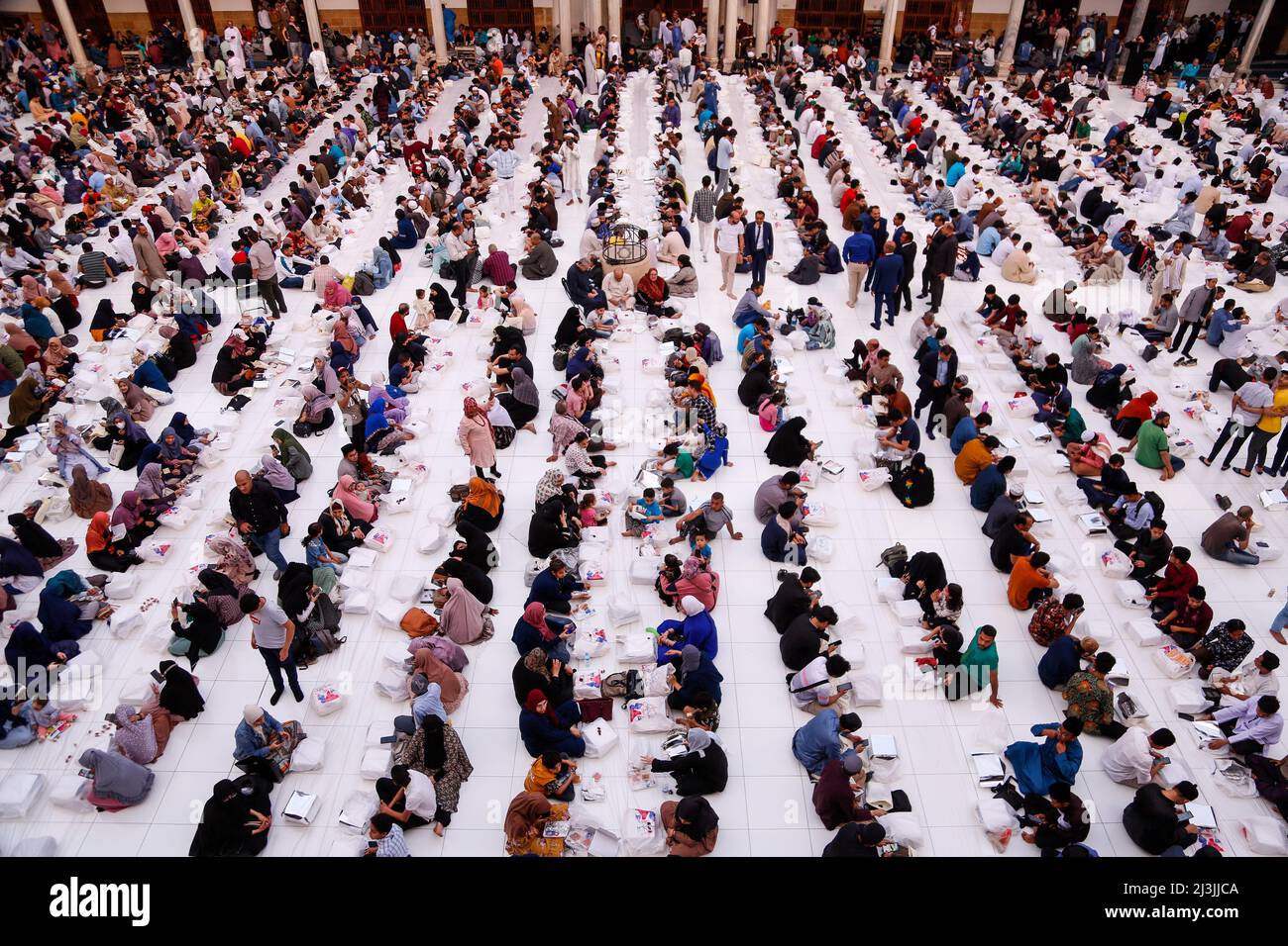 Cairo, Egypt. 08th Apr, 2022. Muslims wait Azan before eating their ...