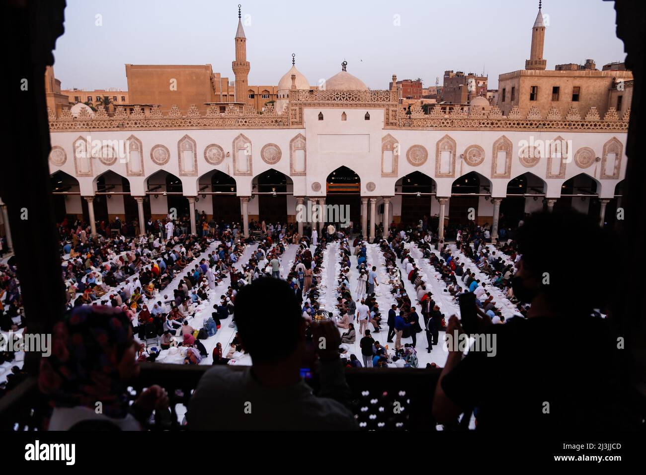 Cairo, Egypt. 08th Apr, 2022. Muslims eat their Iftar meal to break ...