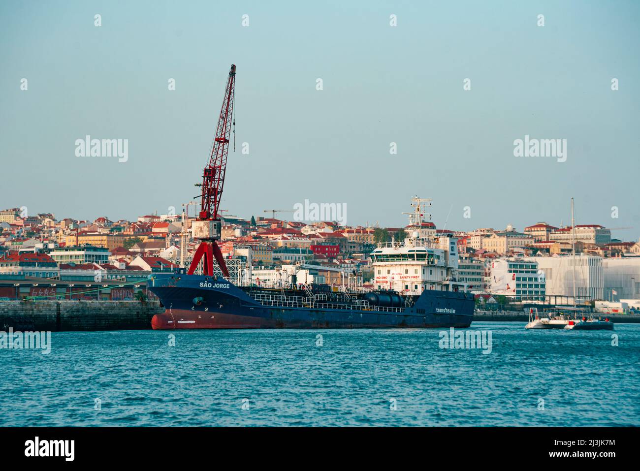 Beautiful skyline of Lisbon view from the water. Turquoise blue river ...
