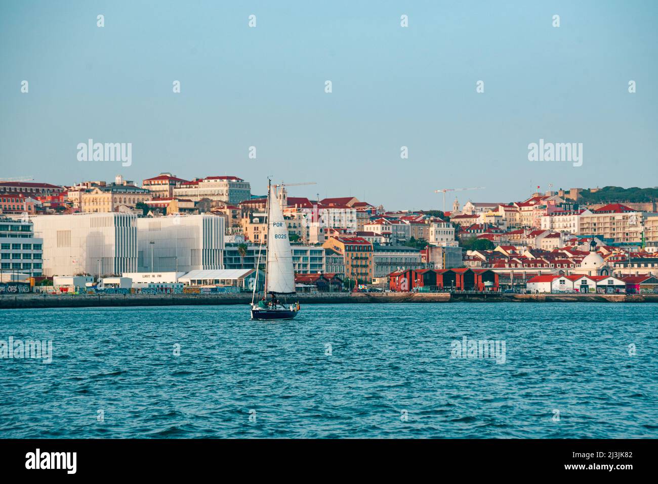 Beautiful skyline of Lisbon view from the water. Turquoise blue river ...