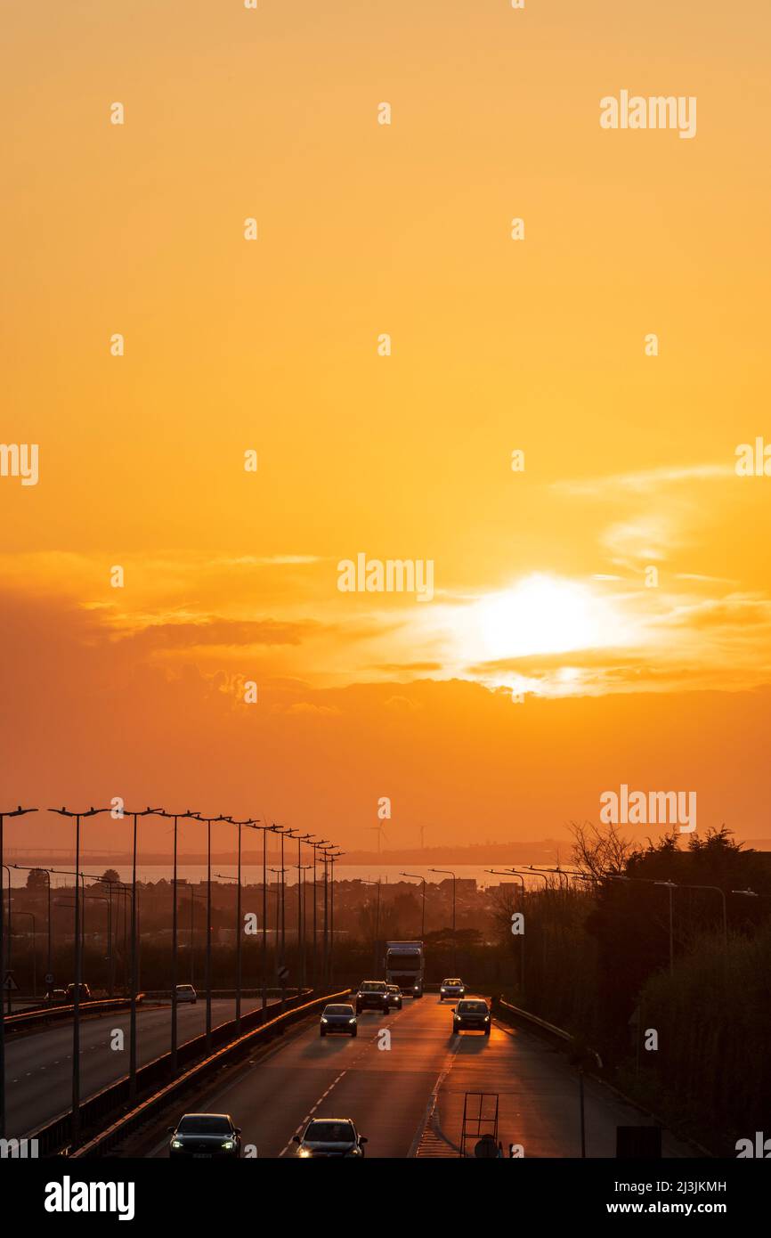 Sunset over traffic on the Thanet Way, A299, an English dual ...