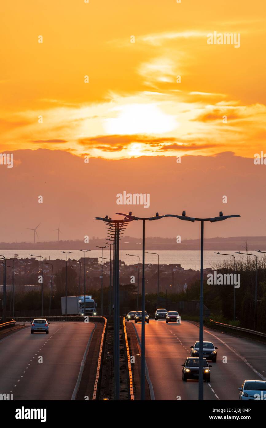 Sunset over traffic on the Thanet Way, A299, an English dual ...