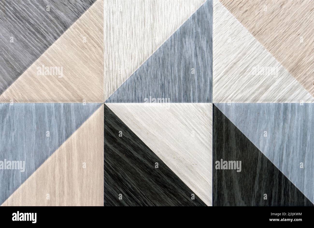 Ceramic tiles in the form of triangles with different textures of wood ...