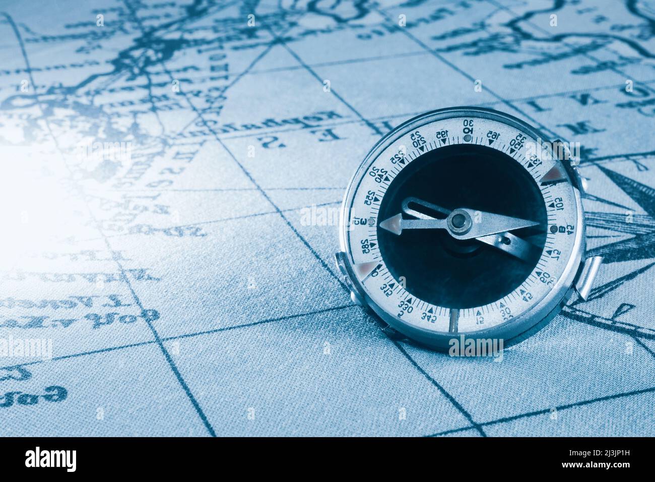 Magnetic old compass on world vintage map.Travel, geography, navigation ...