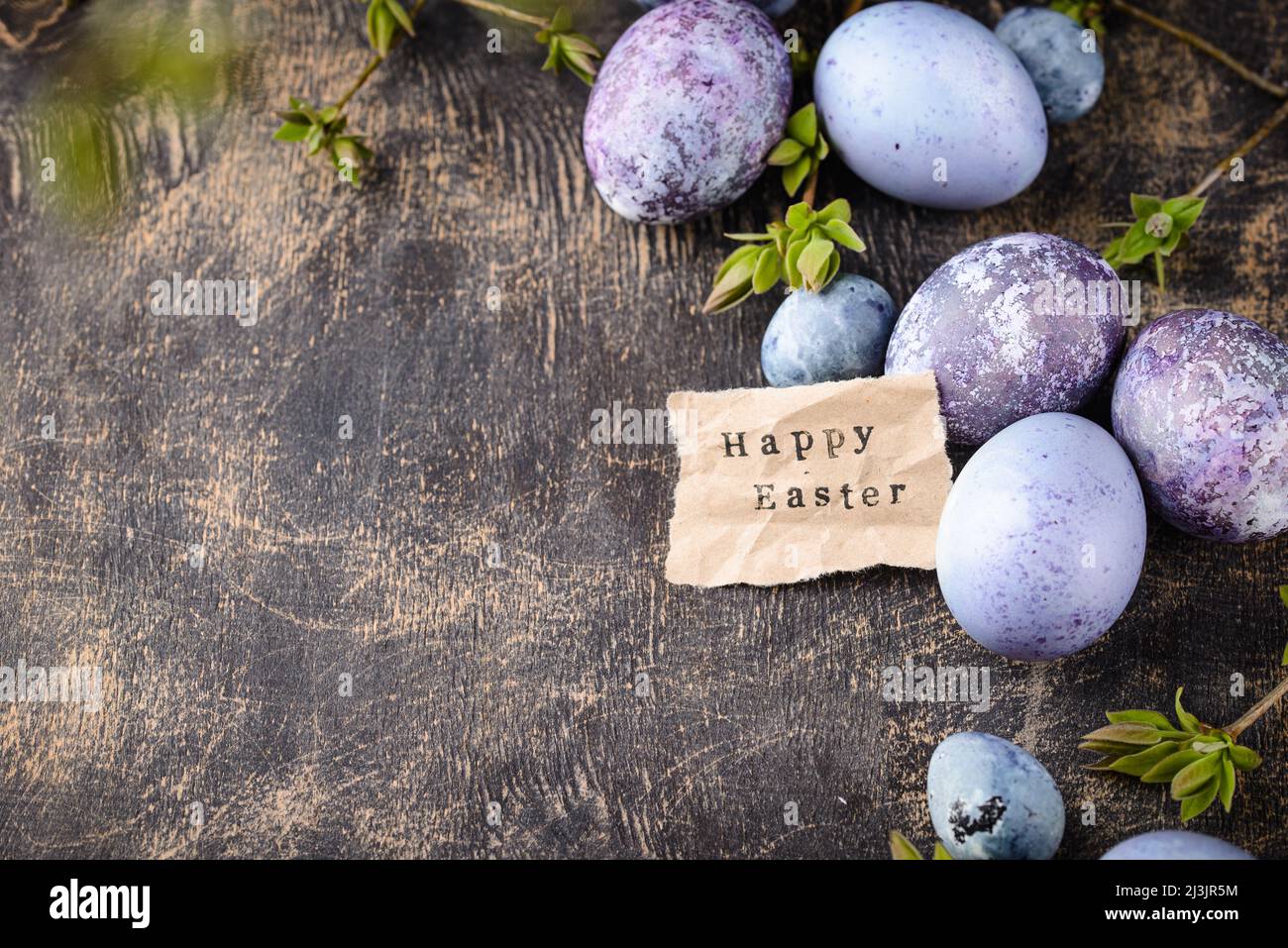 Festive Easter eggs in purple and blue color Stock Photo - Alamy