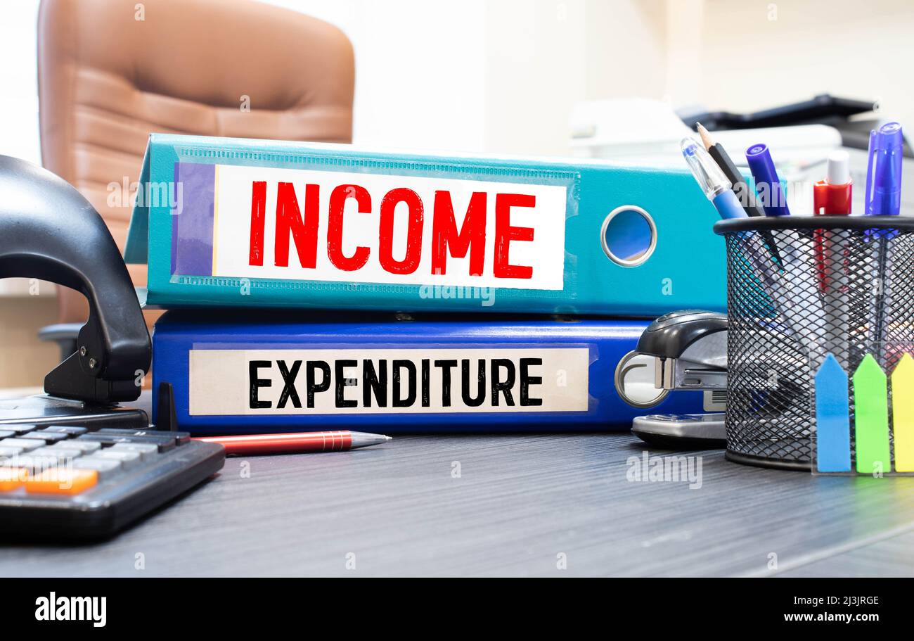 Folders with the label Income and Expenditure Stock Photo - Alamy