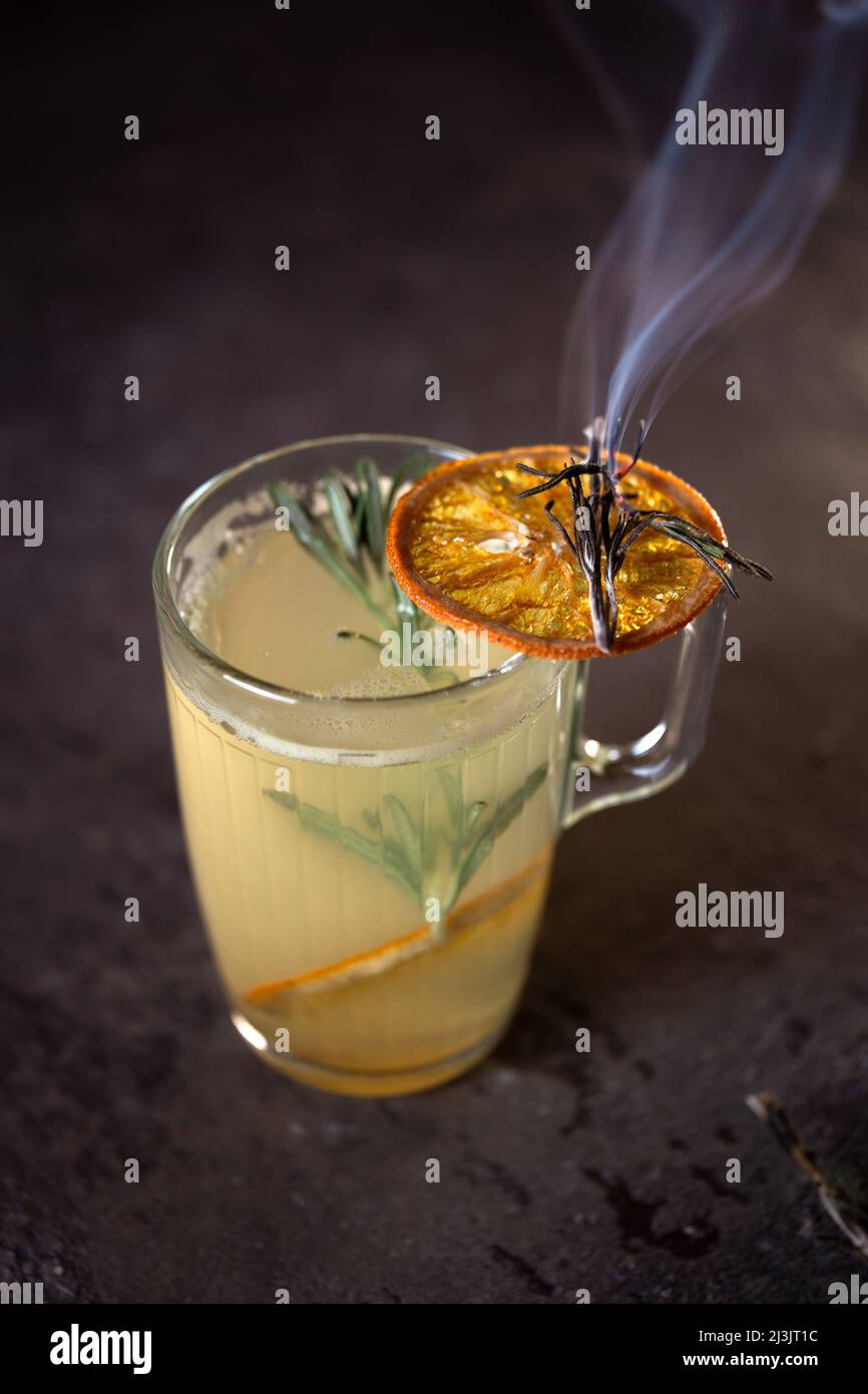 a cup of lemon ginger tea with honey Stock Photo - Alamy