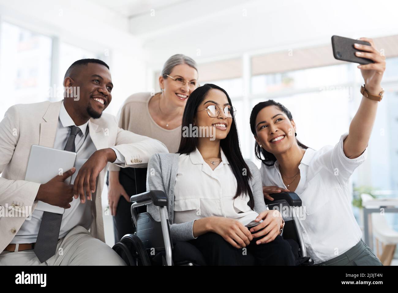 Introducing the team. Cropped shot of a group of diverse businesspeople ...