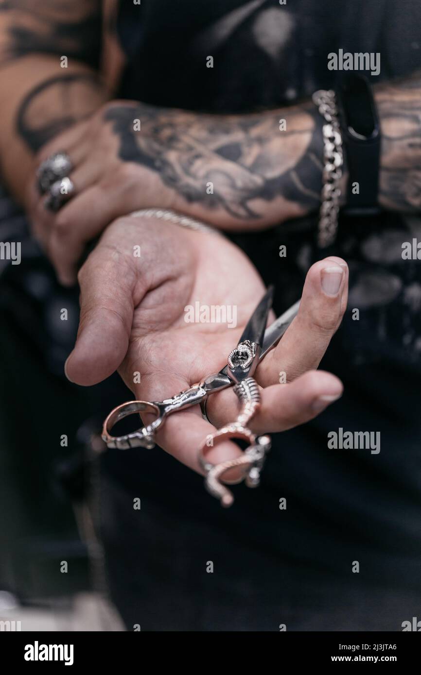 male barber hands with tattoos and beautiful scissors Stock Photo - Alamy