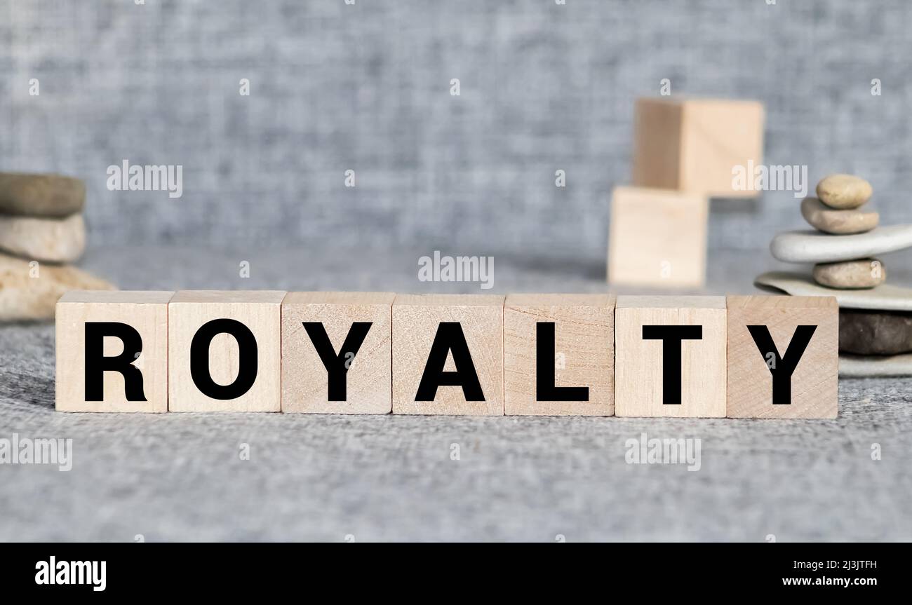 word royalty spelled on dice Stock Photo - Alamy