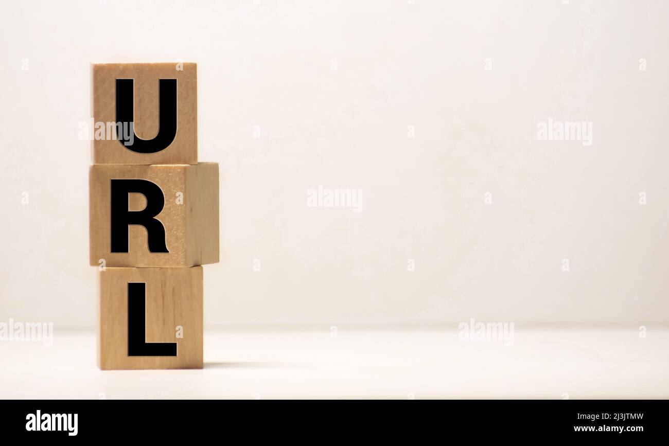 Letters abbreviation url www on wooden cubes, on a dark background ...