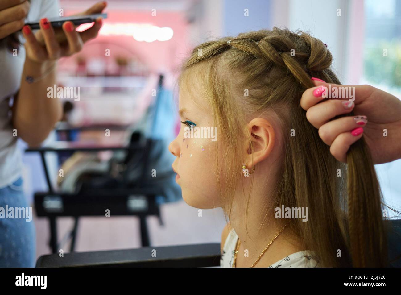 Children make up. Glitter makeup. Sparkles on cheek Stock Photo - Alamy
