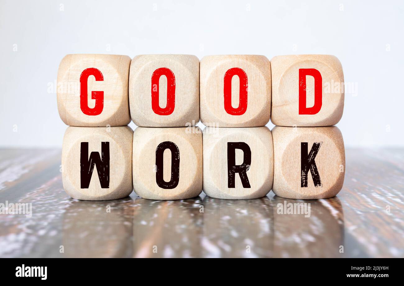 Cubes and dice with messages Good Work and Well Done Stock Photo - Alamy