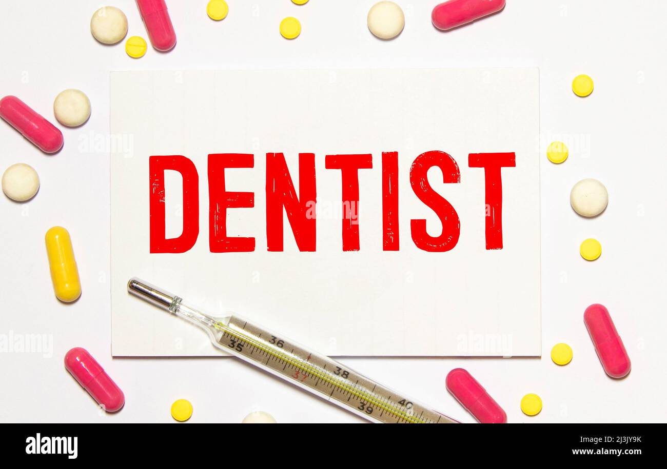Dentist sign in a wood, medical word concept Stock Photo - Alamy