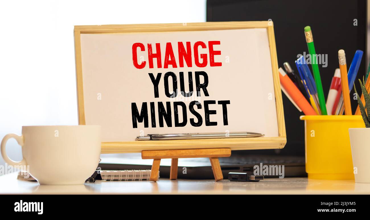 Change Your Mindset Text written on notebook page, red pencil on the ...