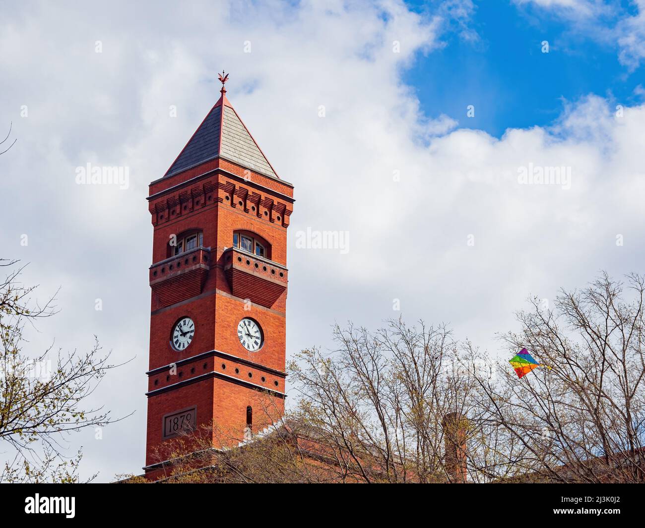 Sunny view of the clock tower of Sidney R. Yates Federal Building at ...