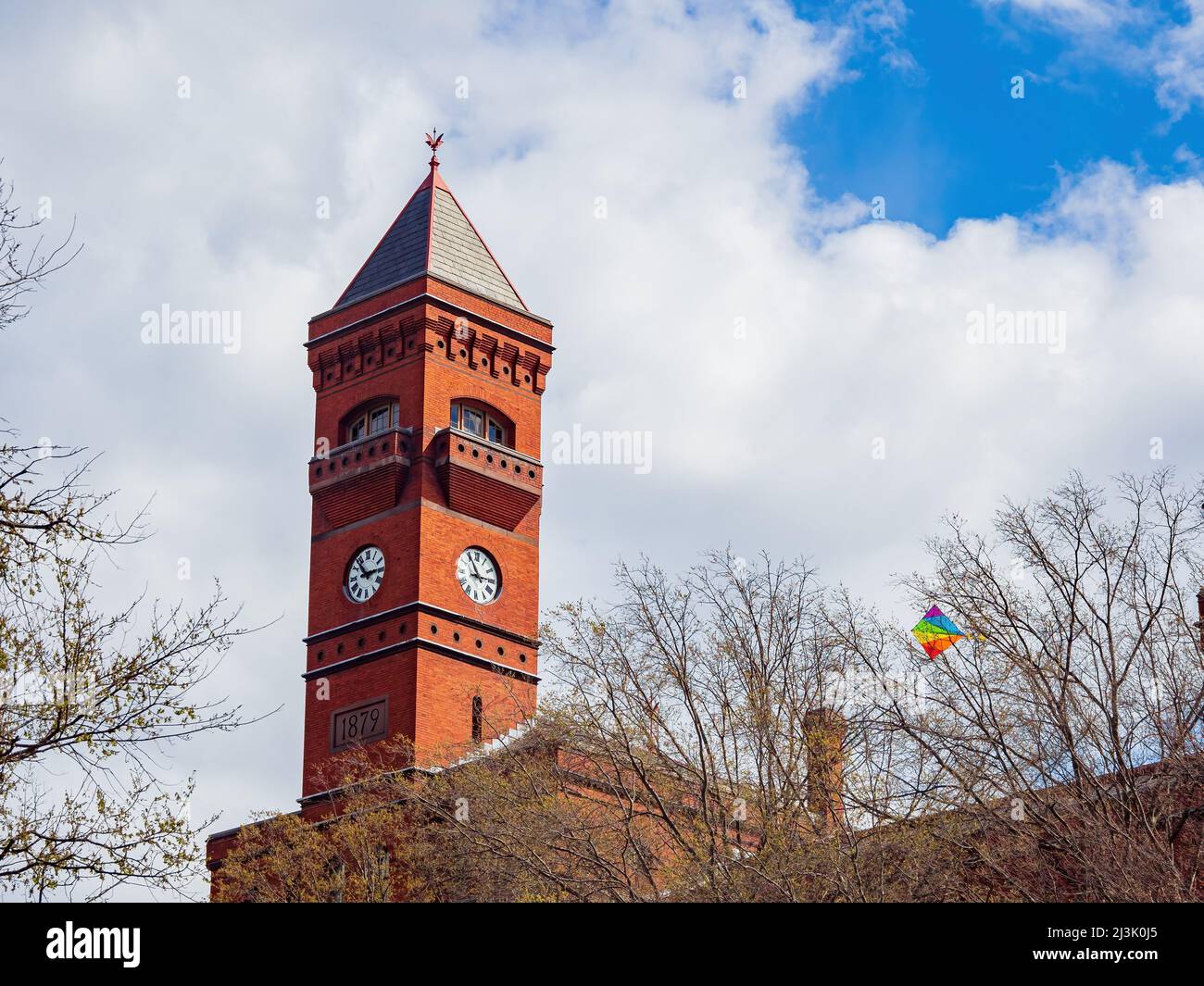 Sunny view of the clock tower of Sidney R. Yates Federal Building at ...