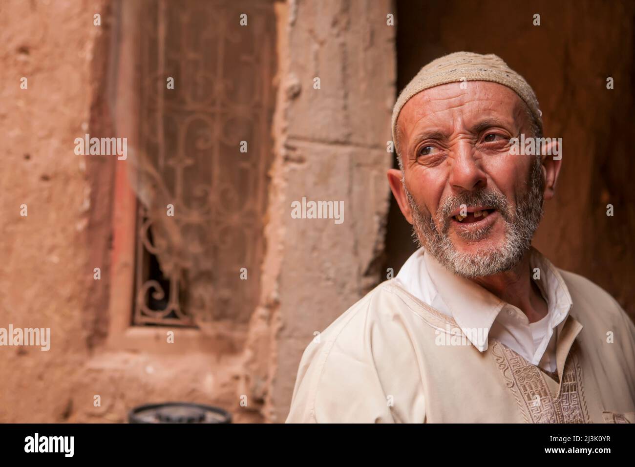 A mature man in traditional clothing in Ait Benhaddou, Morocco, a small ...
