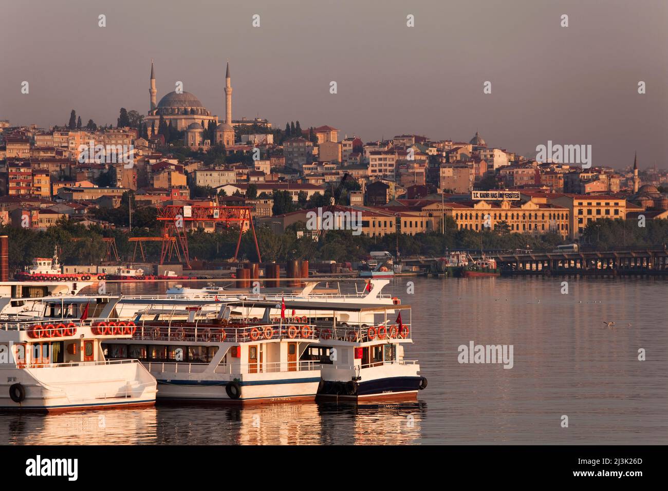 View of Sulumaniye Mosque from Galata Bridge, crossing the Golden Horn ...