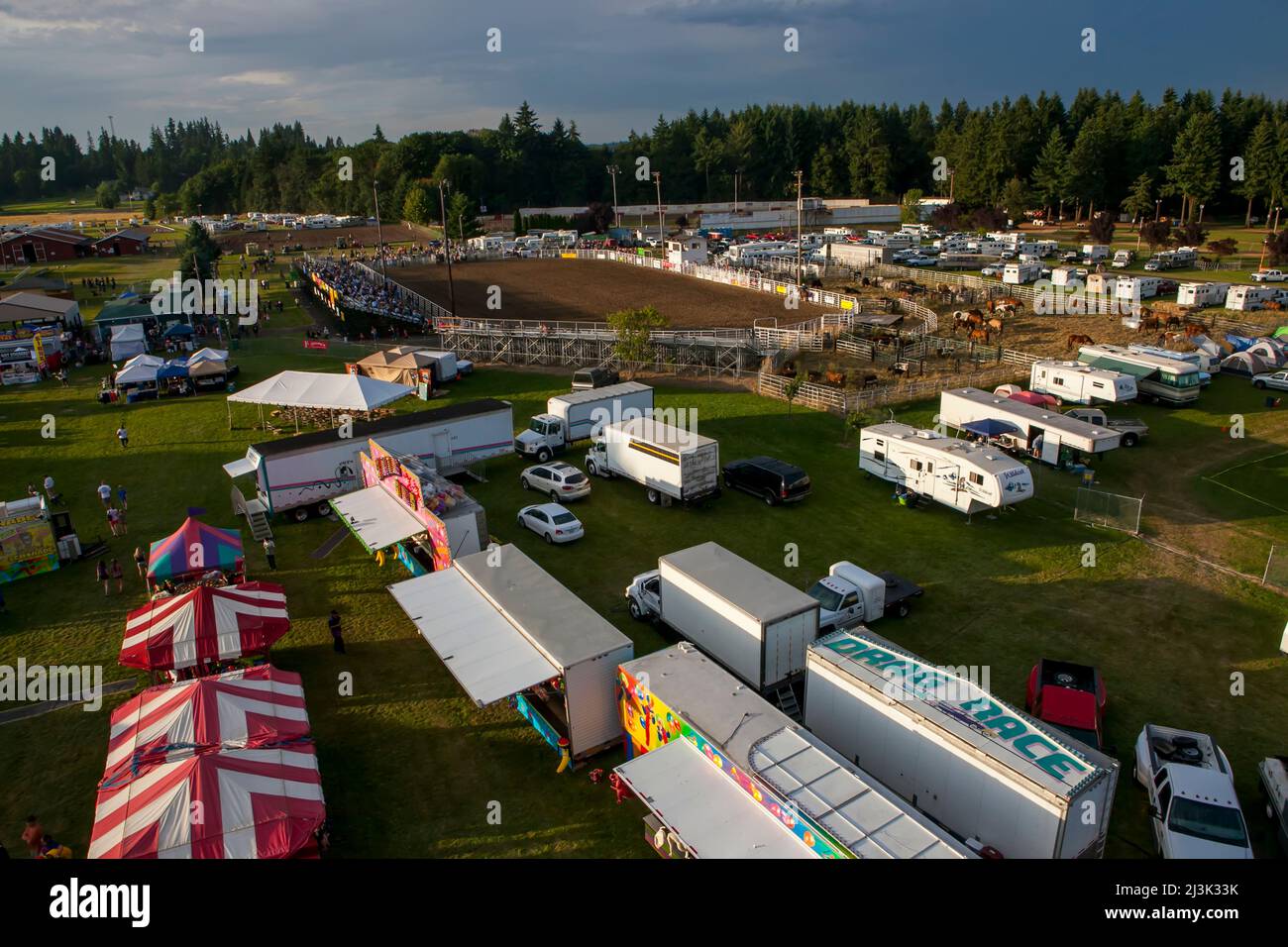 In St. Helens, Oregon, a traveling carnival is set-up alongside a horse ...