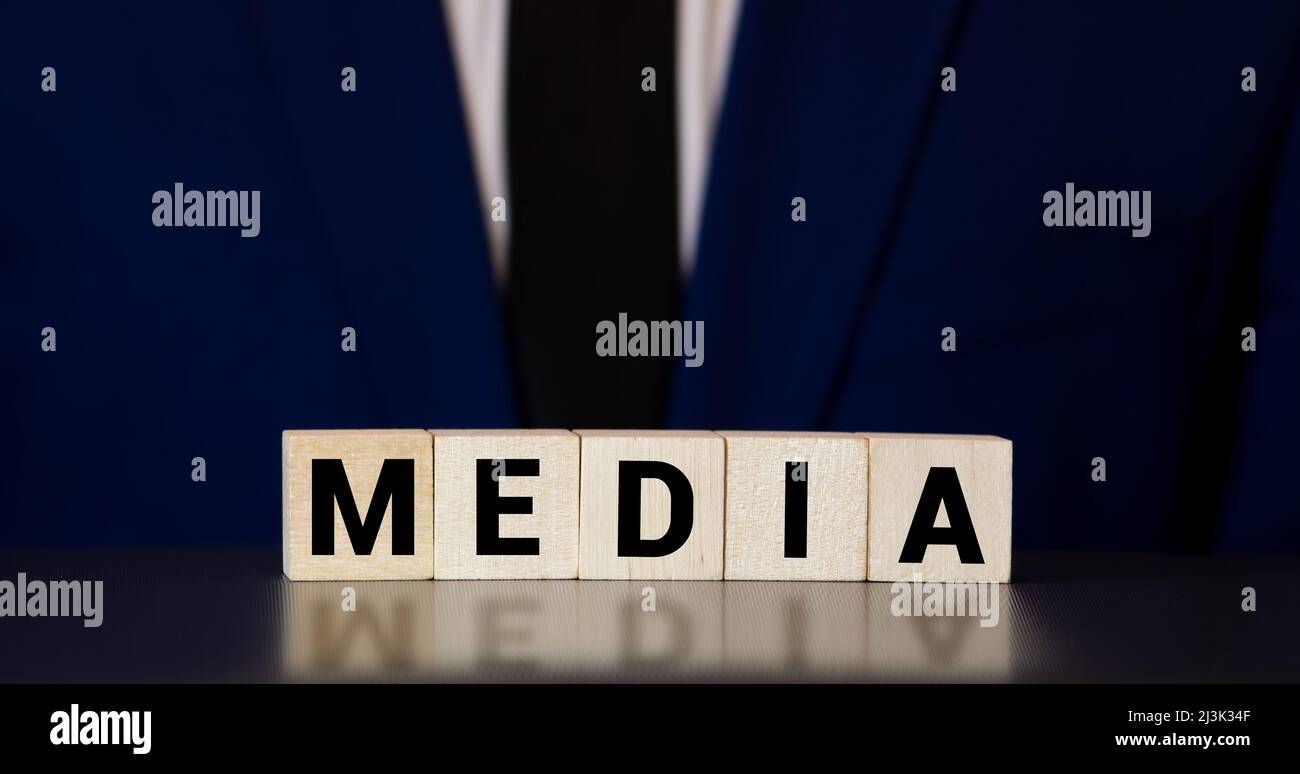 Media word written on wood block. Media motivation text on wooden ...