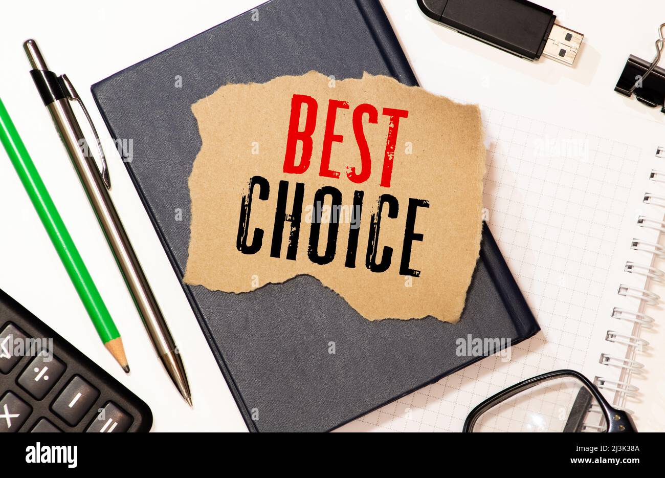 best choice sign a paper price tag against rustic red painted barn wood ...