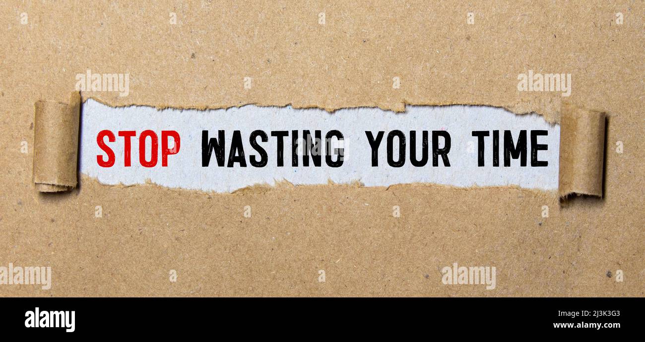 Writing Motivational Text Stop Wasting Your Time Stock Photo - Alamy