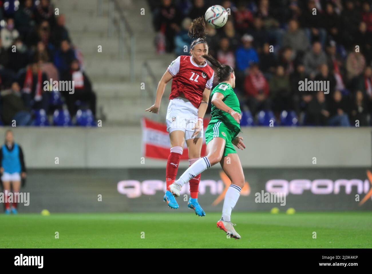 Stefanie Enzinger heads the ball during the FIFA WWC 2023 qualifying ...