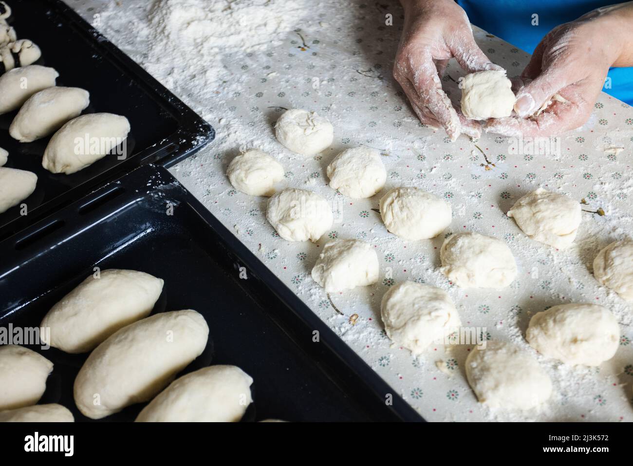 Womans hands rolling the dough for pies. Baking at home Stock Photo - Alamy