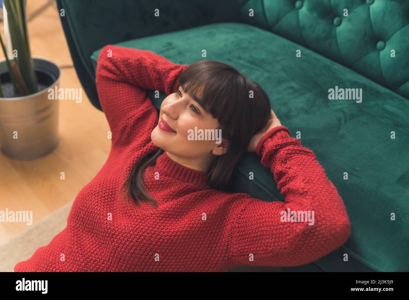 Woman hands on head lying down hi-res stock photography and images - Alamy