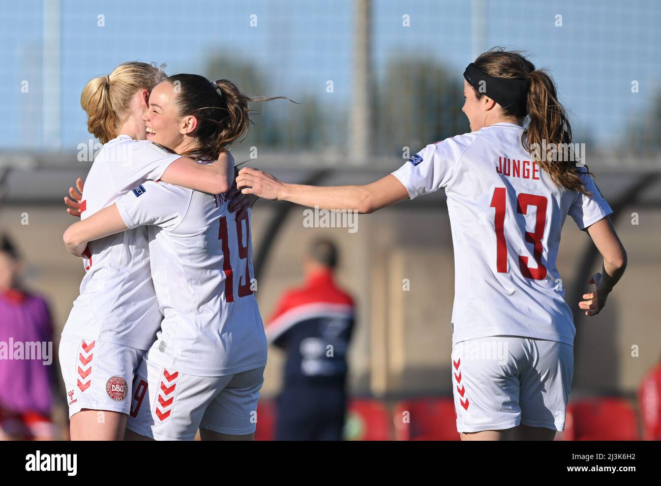 Teammates celebrate Janni Thomasen (#19 Denmark) after first goal ...