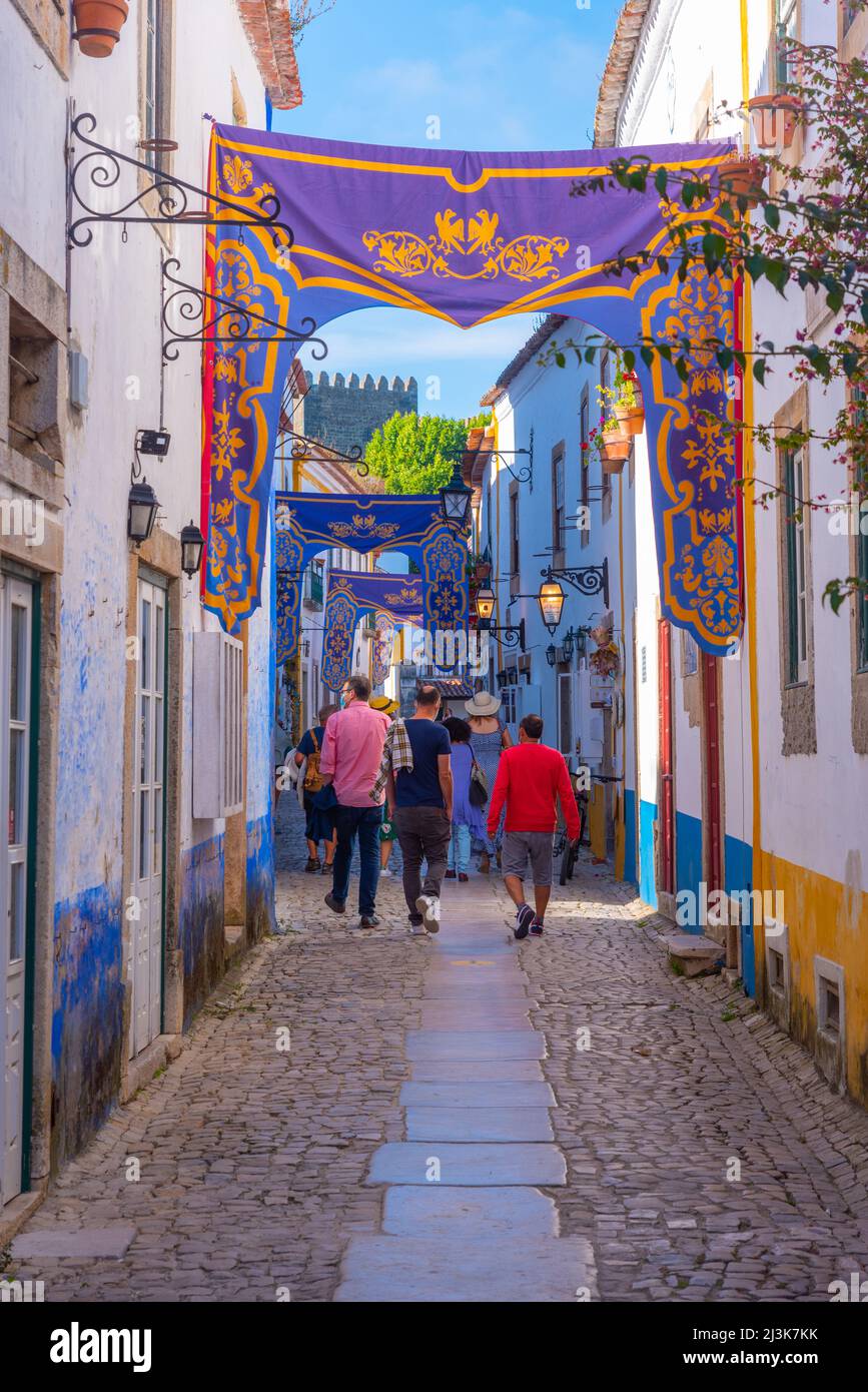 Obidos, Portugal, July 1, 2021: View of a narrow street inside of the ...