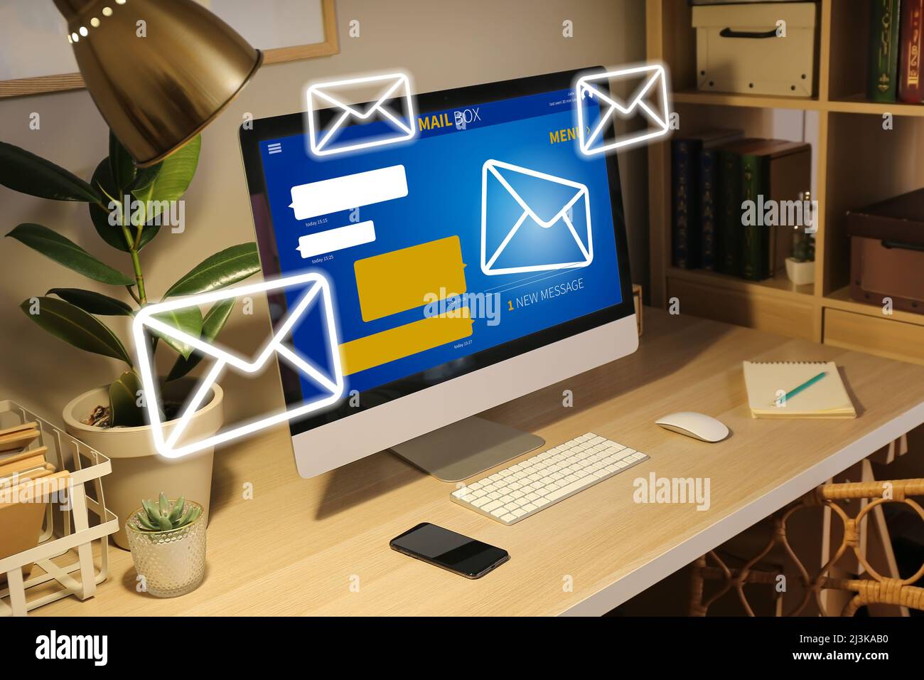 Computer with open mail box on screen at workplace Stock Photo - Alamy